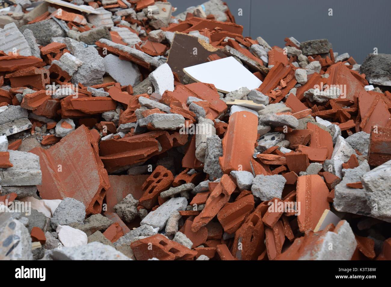 constructions waste consists of unwanted material produced dirctly or ...