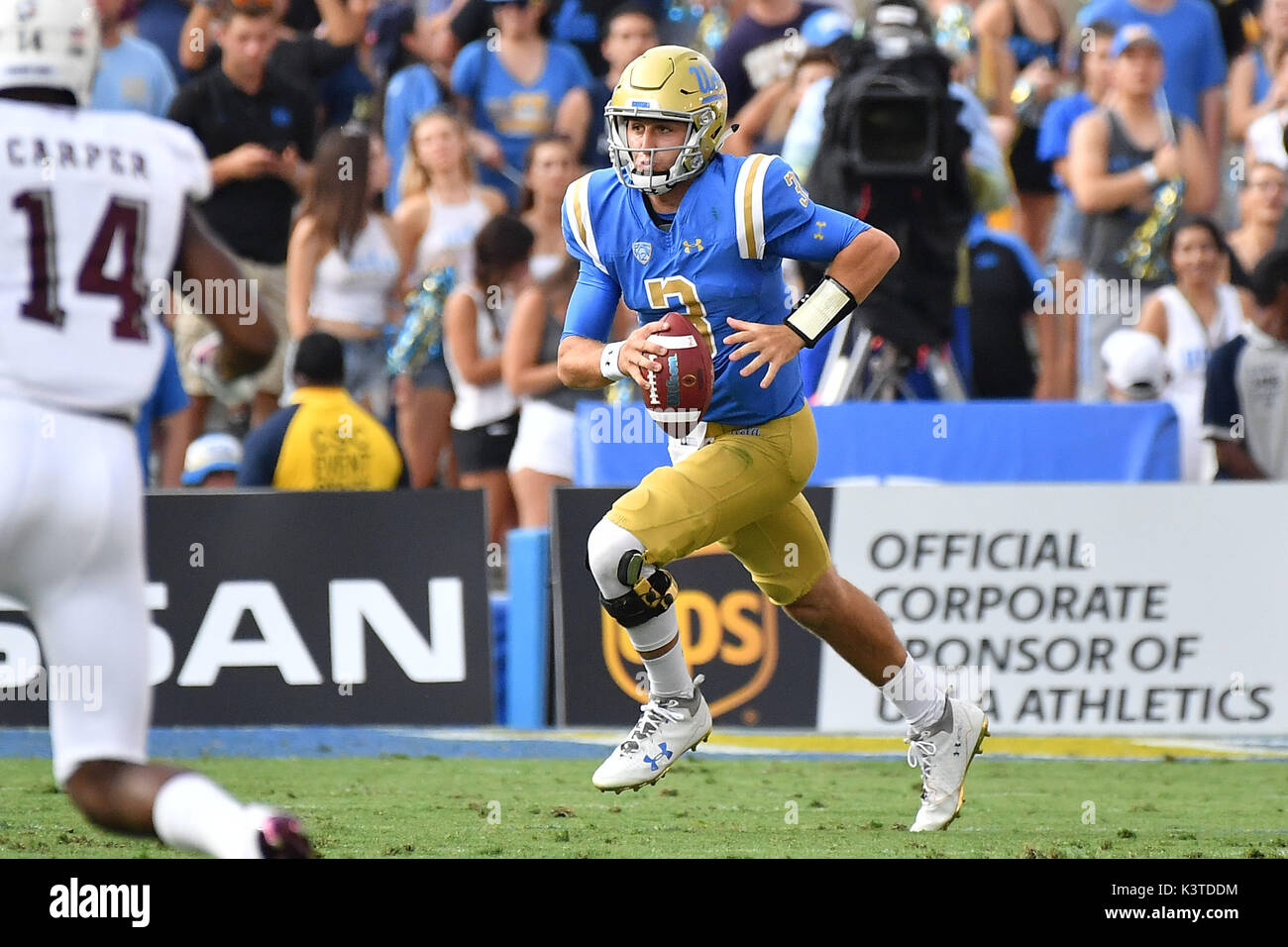 Pasadena, CA. 3rd Sep, 2017. UCLA Bruins quarterback Josh Rosen #3 runs ...
