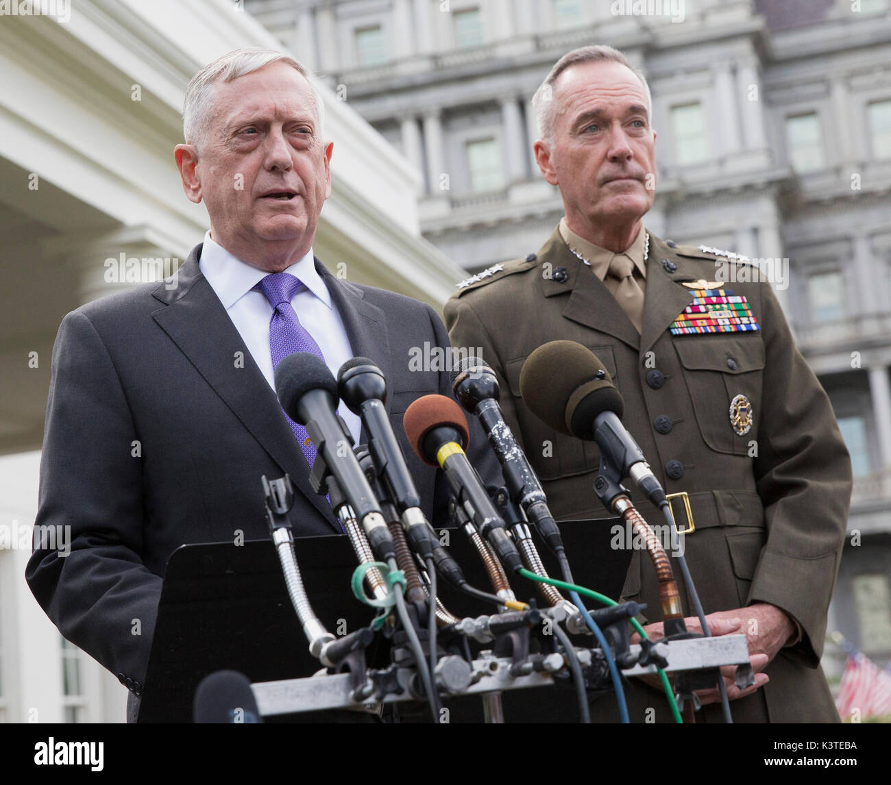 United States Secretary of Defense James Mattis (left) makes a ...