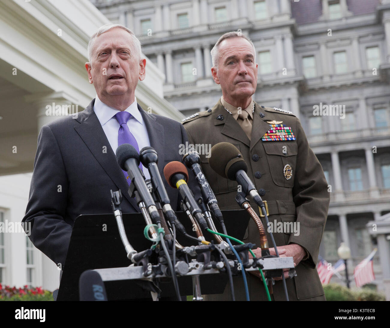 United States Secretary of Defense James Mattis (left) makes a ...