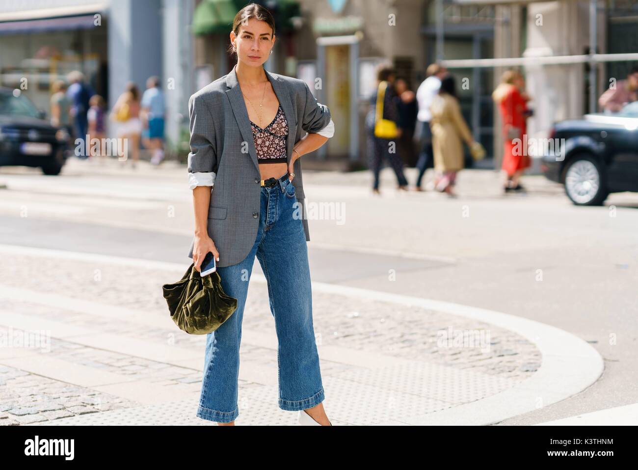 Blogger Irina Lakicevic posing outside the Baum und Pferdgarten runway ...
