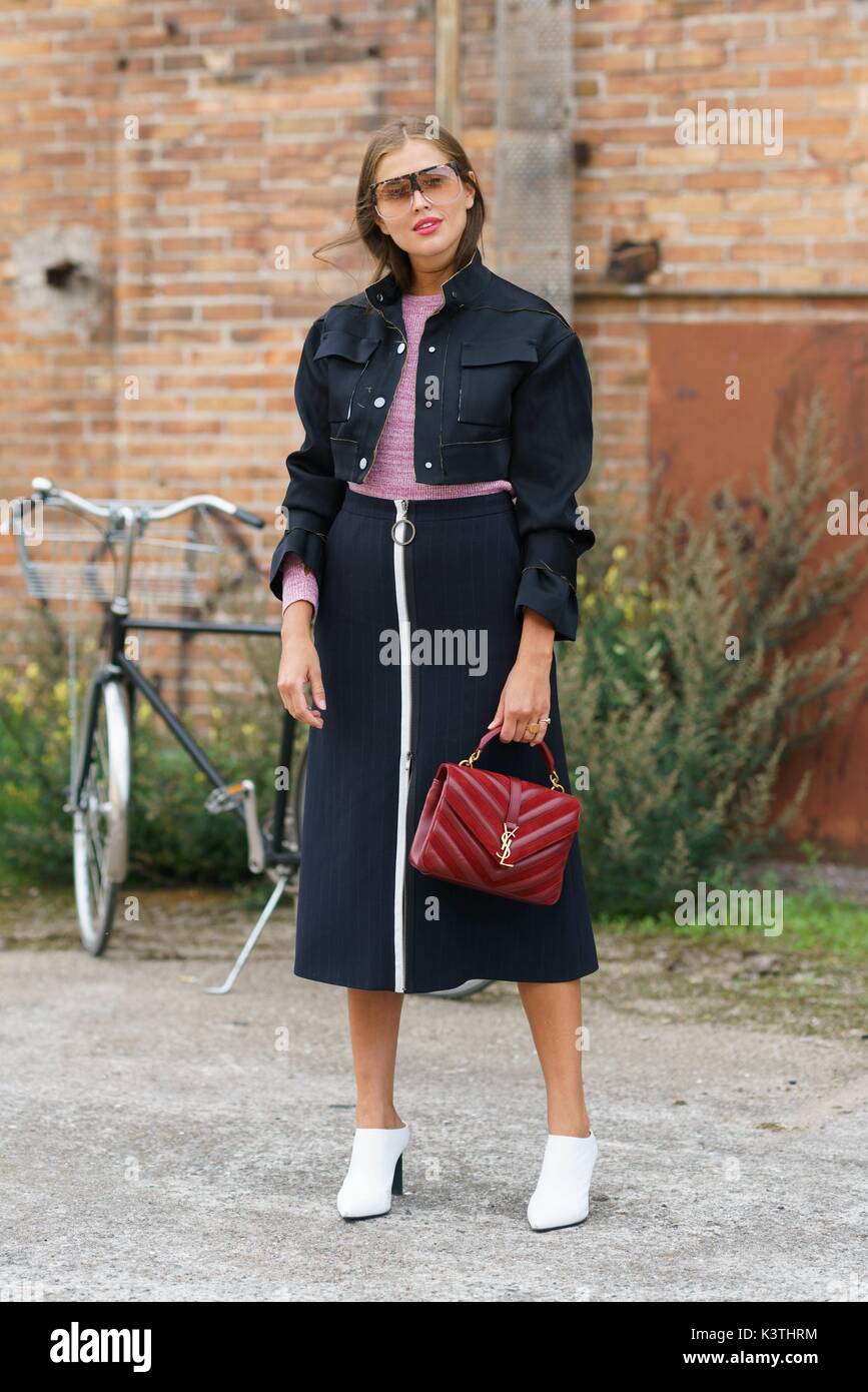 Editor Darja Barannik posing outside the Ganni runway show during Copenhagen Fashion Week - Aug ...