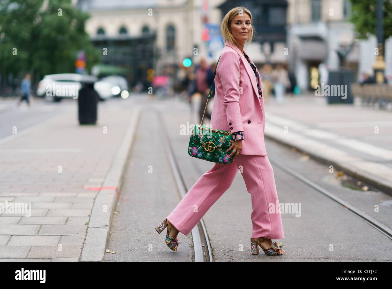 Blogger Janka Polliani posing outside the Rodebjer runway show during ...