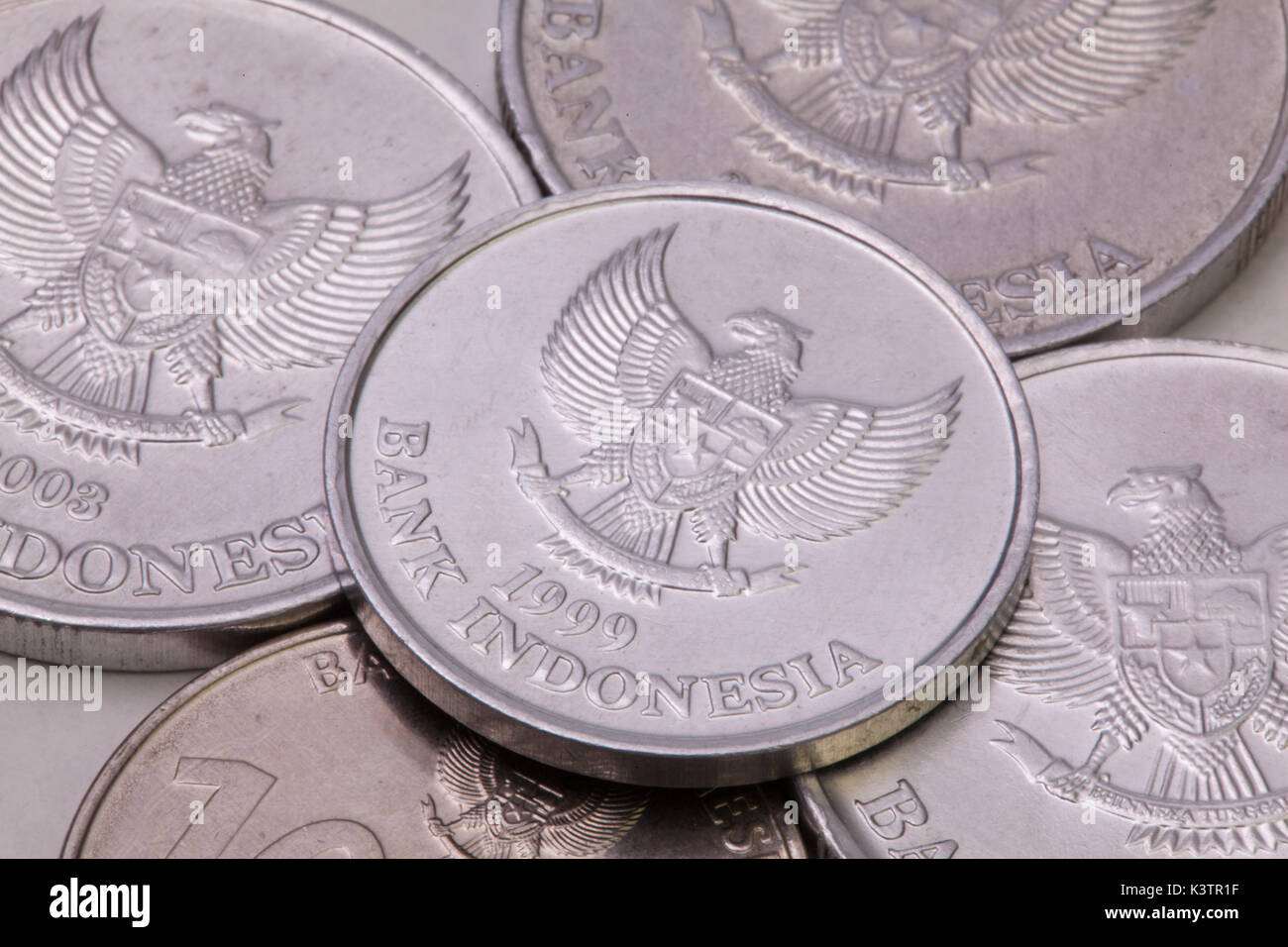 Detail of different Indonesian rupiah coins on the table Stock Photo ...