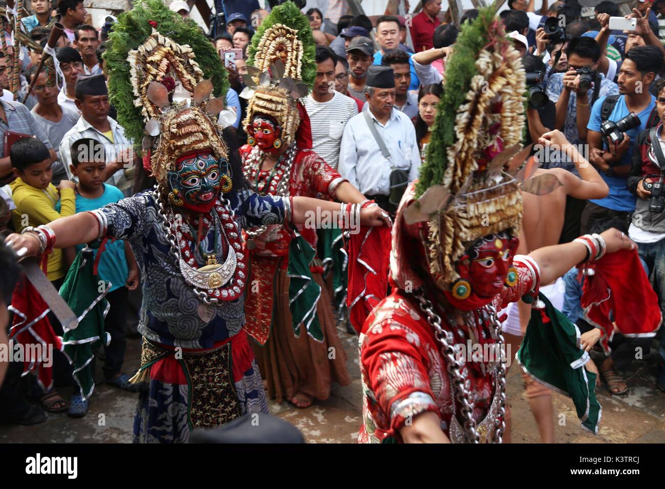 Kathmandu, Nepal. 03rd Sep, 2017. Masked dancers perform during the ...