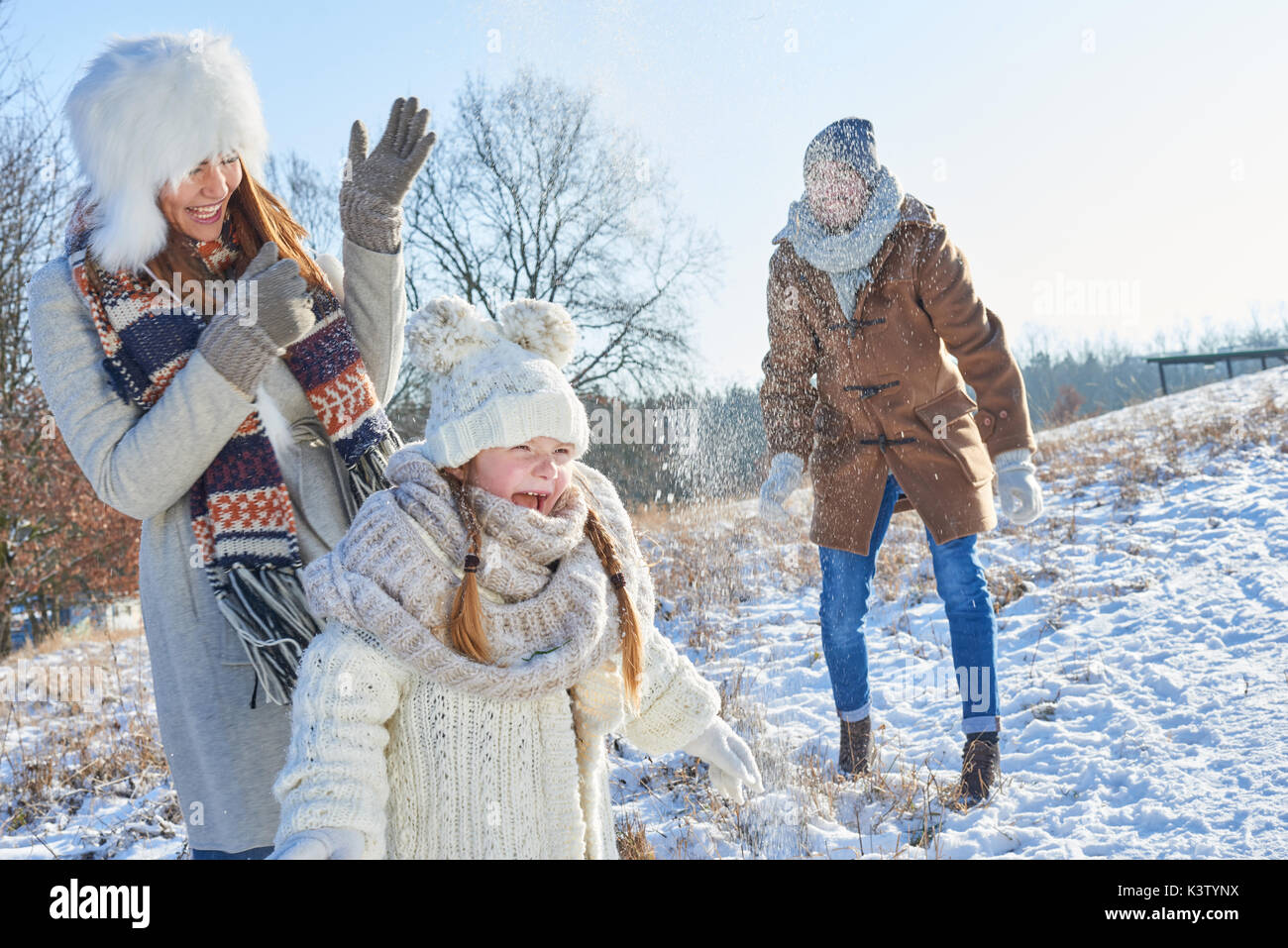 Snowball fight hi-res stock photography and images - Alamy