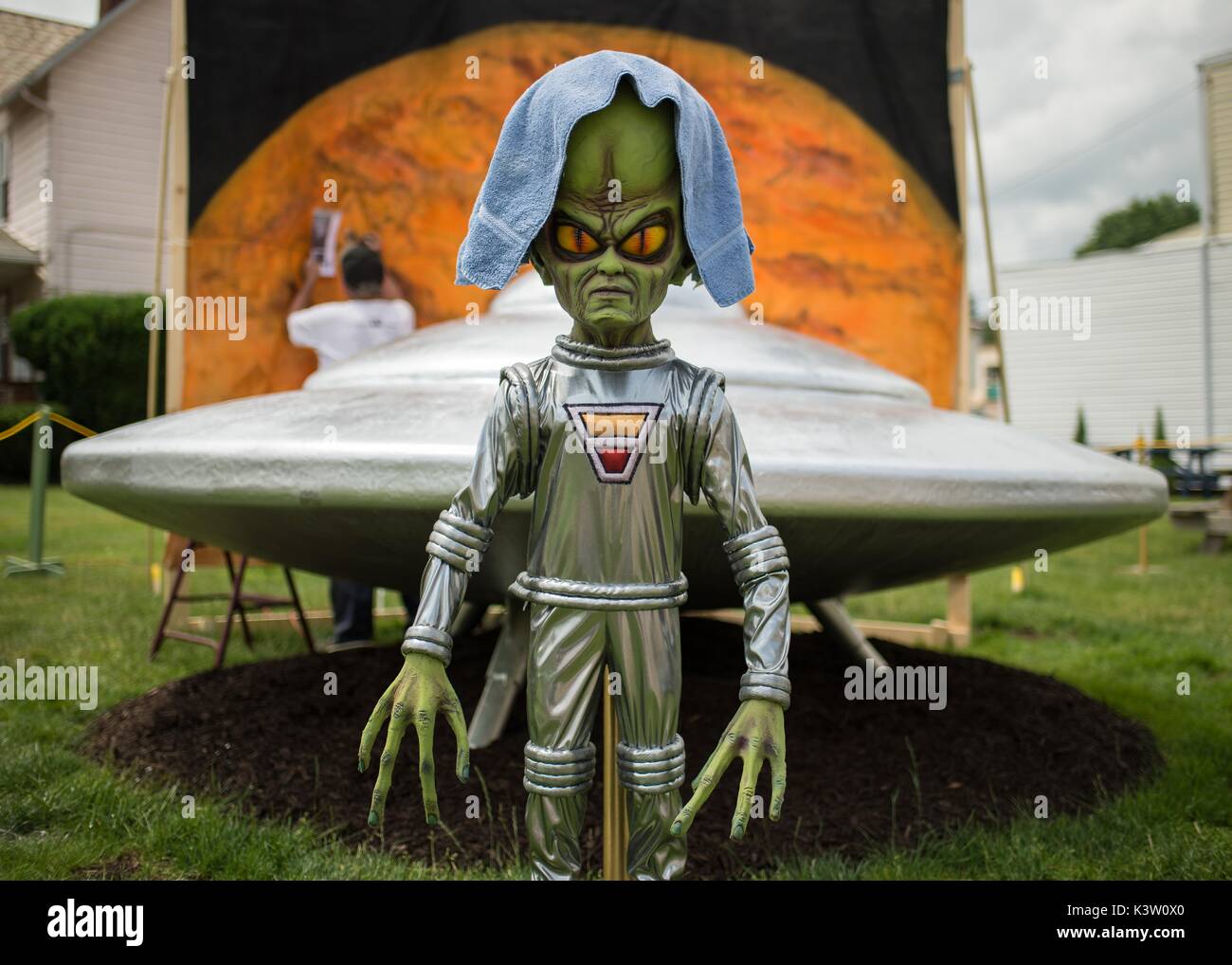 An alien statue and sculpture of a UFO is set up for the Mars New Years ...