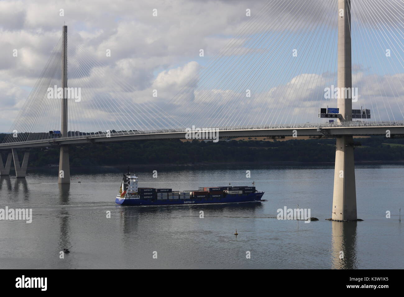 Container ship passing under Queensferry Crossing during Queensferry ...
