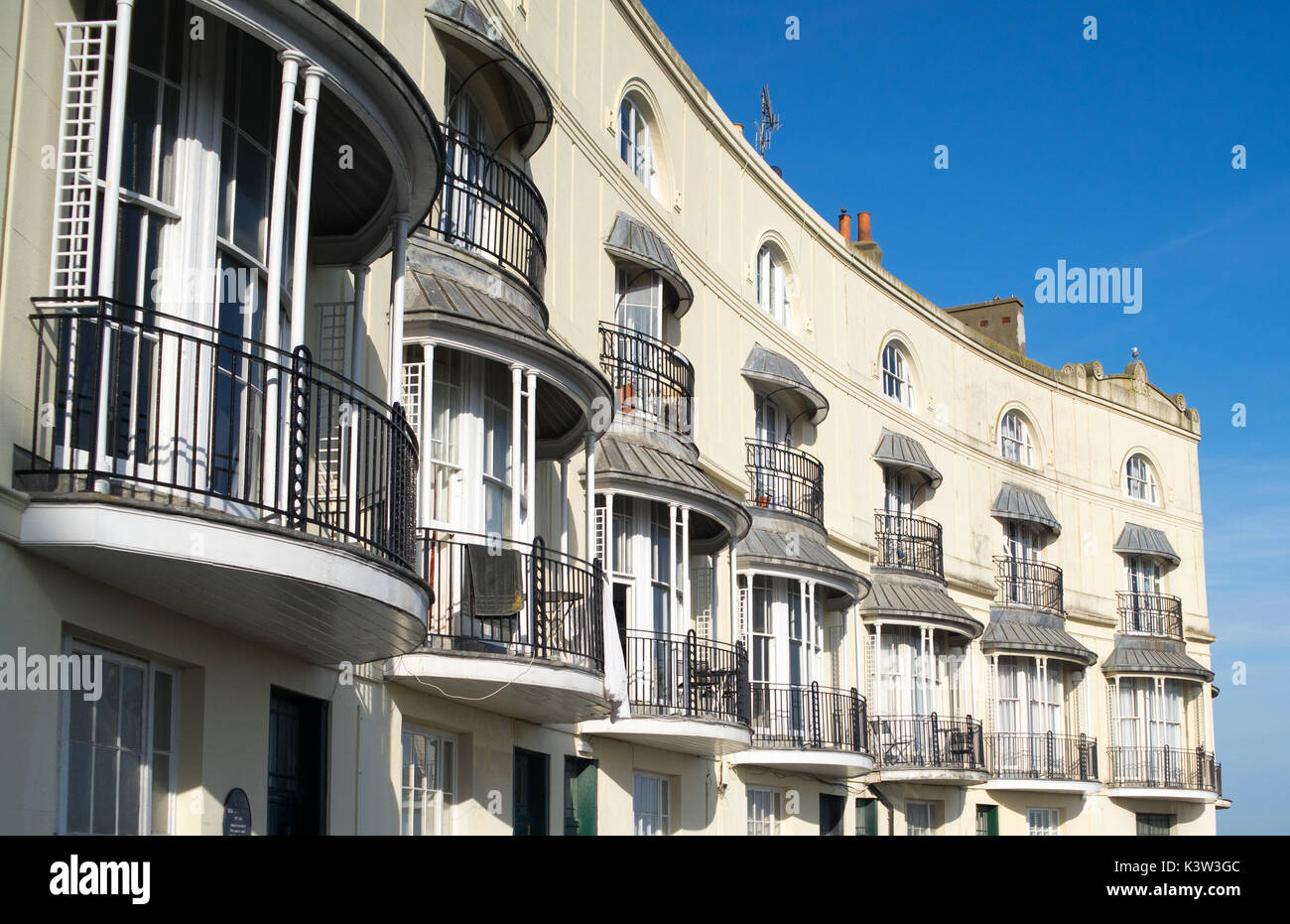 Middle class buildings with balconies on Hastings sea front, UK Stock ...