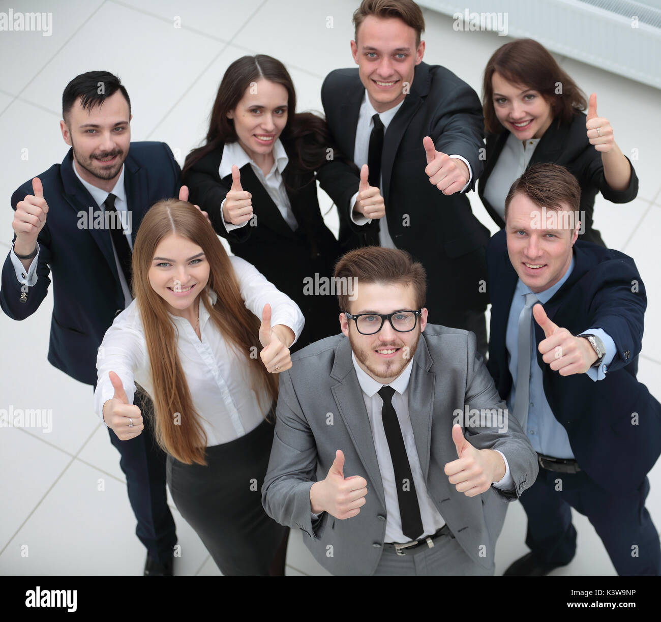 Portrait triumphant business team hi-res stock photography and images ...