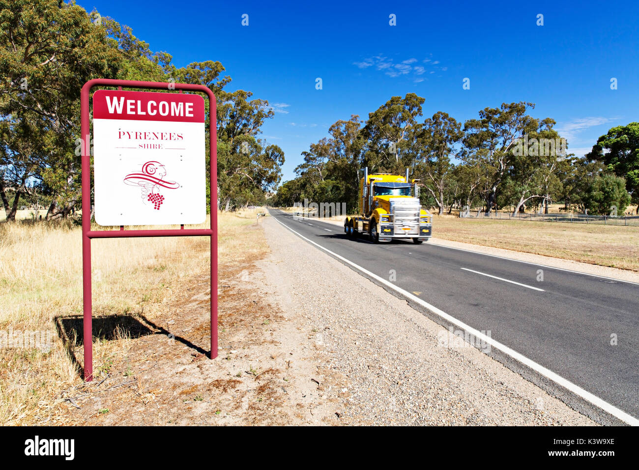 Truck travelling on country highway in the Pyrenees Region of Victoria ...
