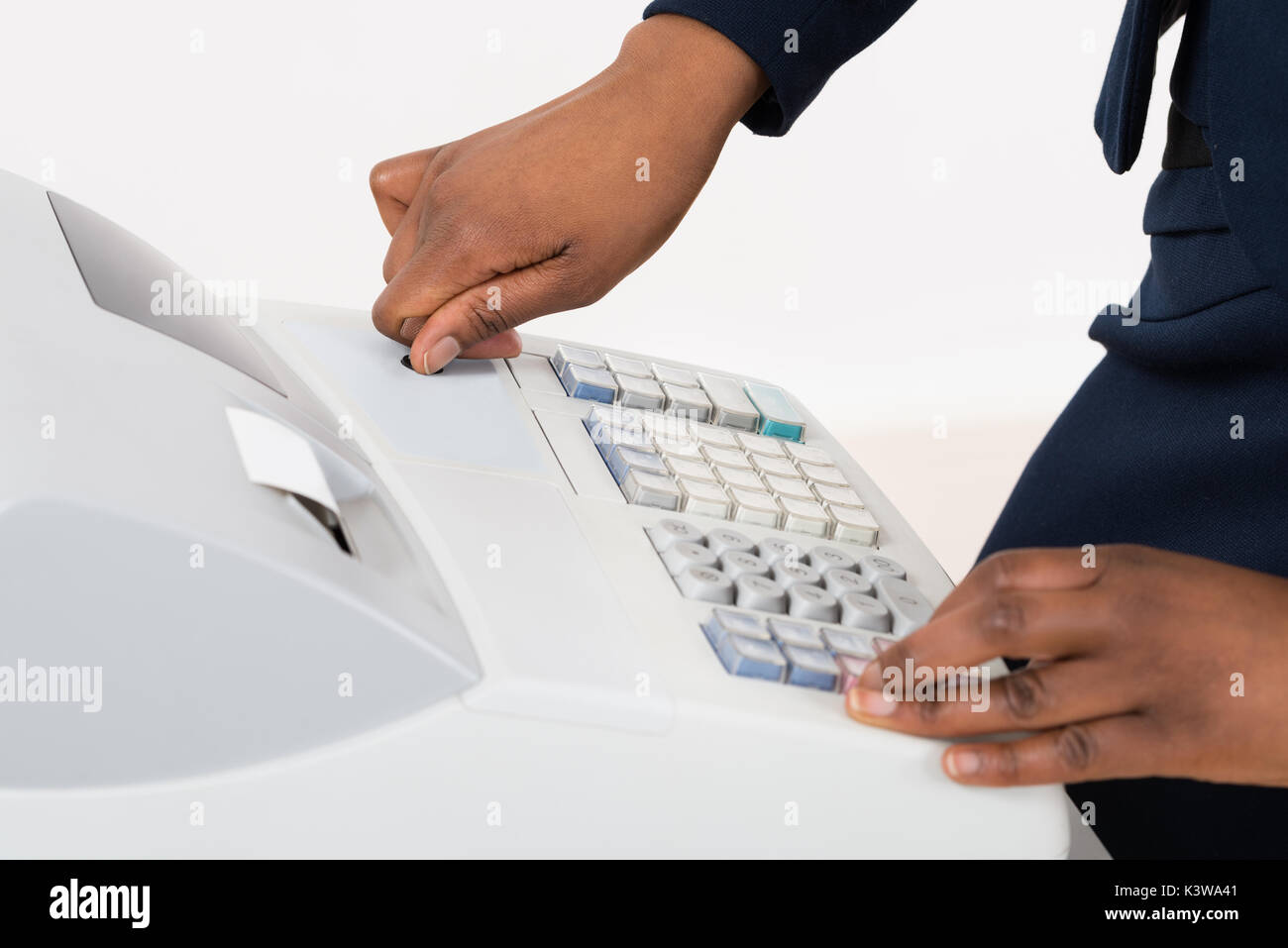 Close-up Of A Sales Person Operating Cash Register Stock Photo - Alamy