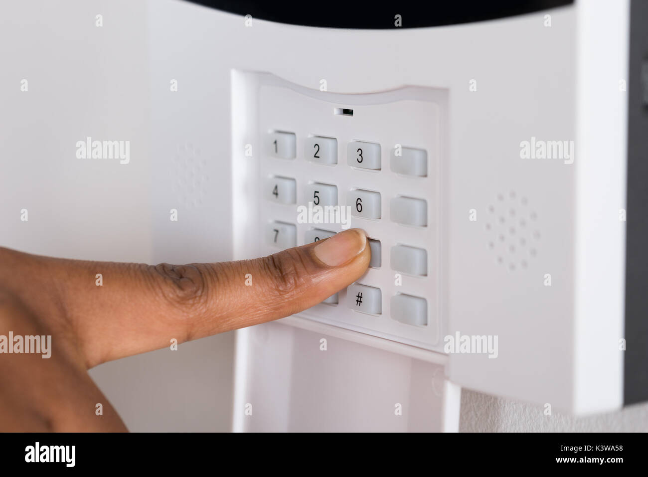 Close-up Of A Person's Hand Entering Code In Security System Stock ...