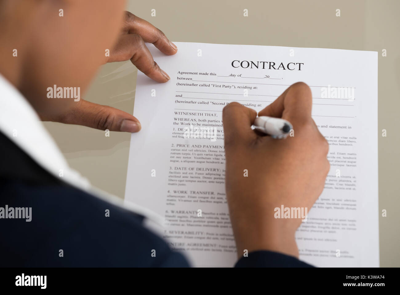 Close-up Of A Businesswoman Filling Contract Form Stock Photo - Alamy