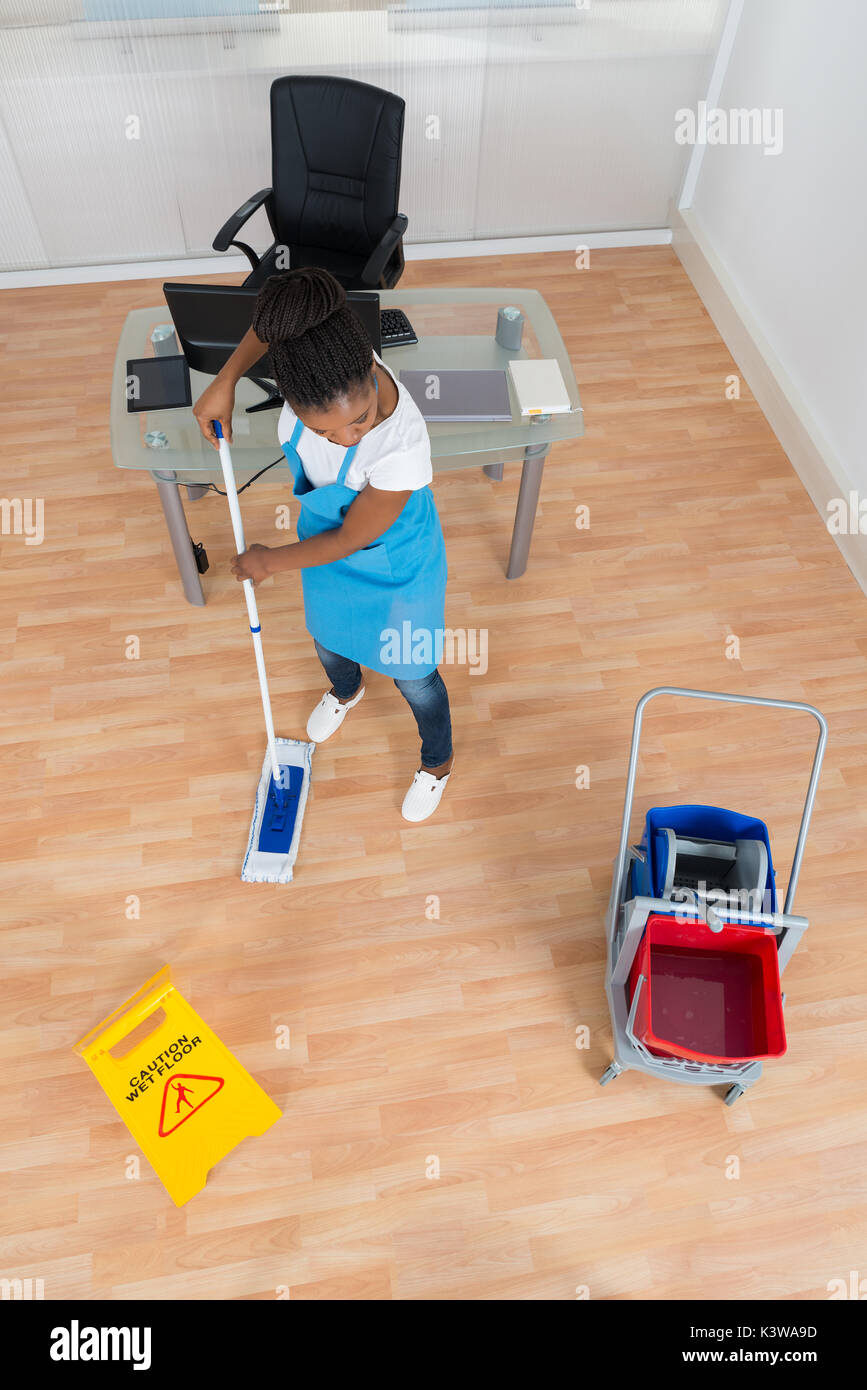 African Woman Sweeping High Resolution Stock Photography and Images - Alamy