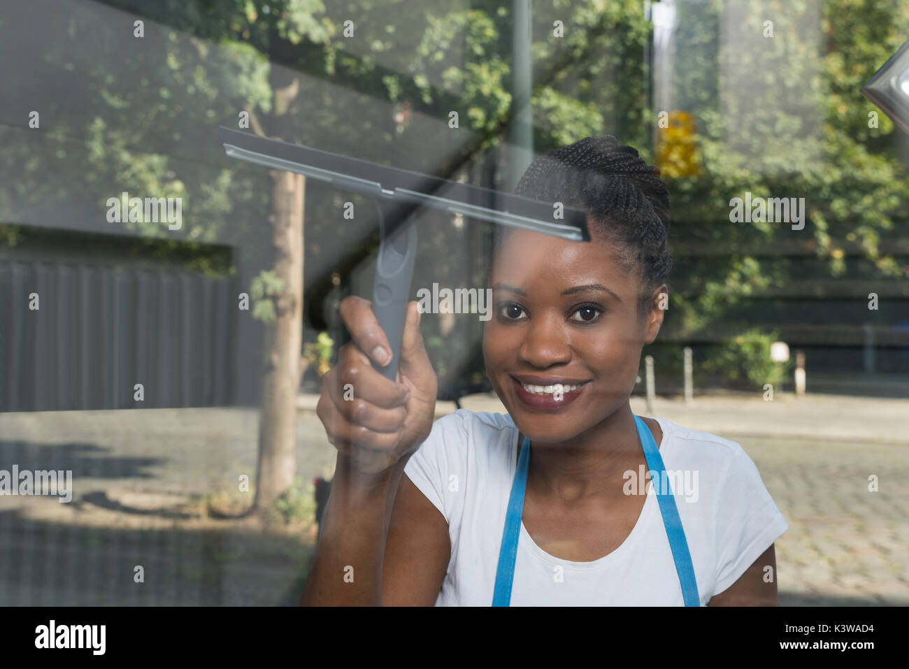 Office window cleaning woman hi-res stock photography and images - Alamy