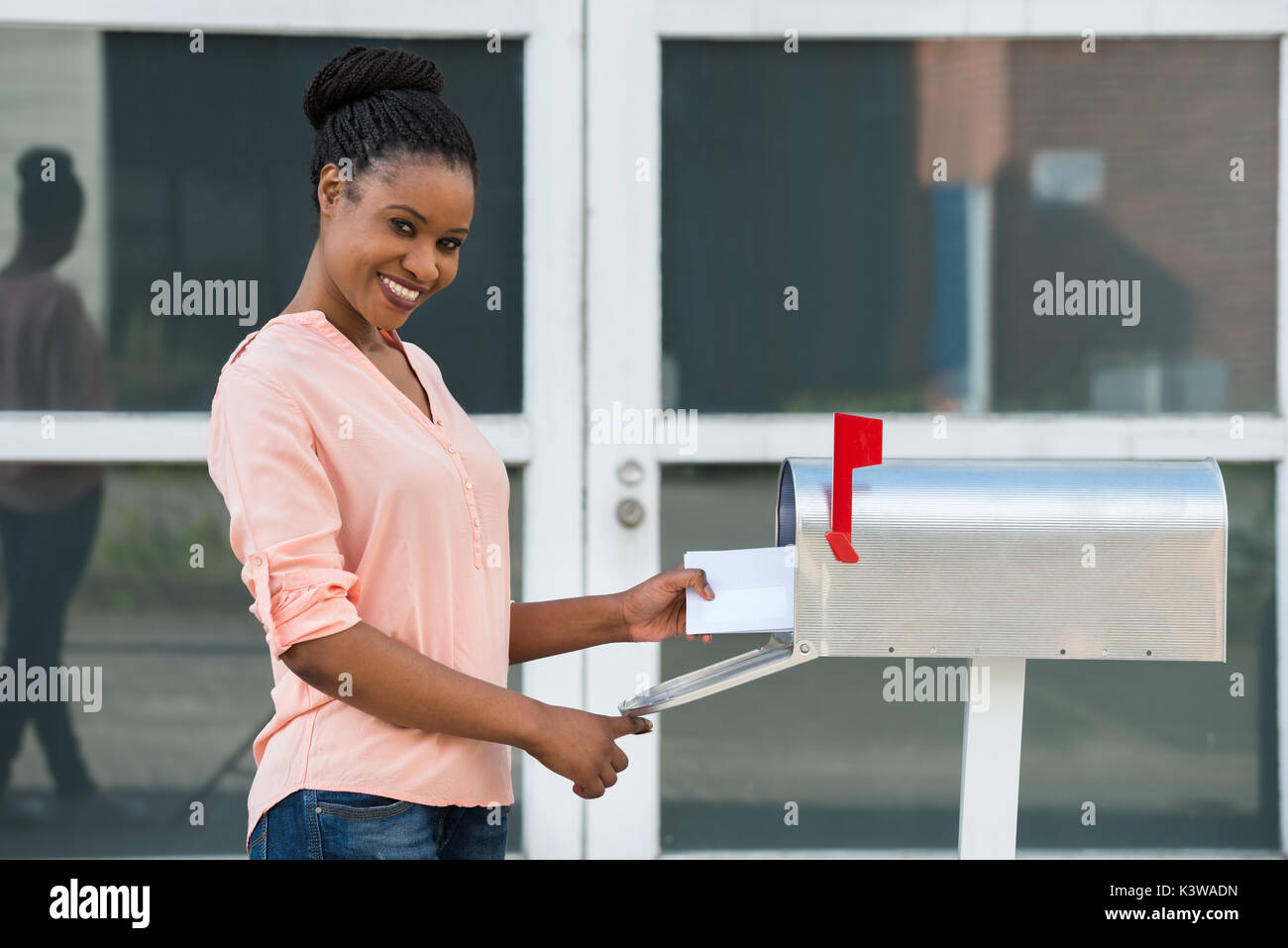 One woman collection box hi-res stock photography and images - Alamy