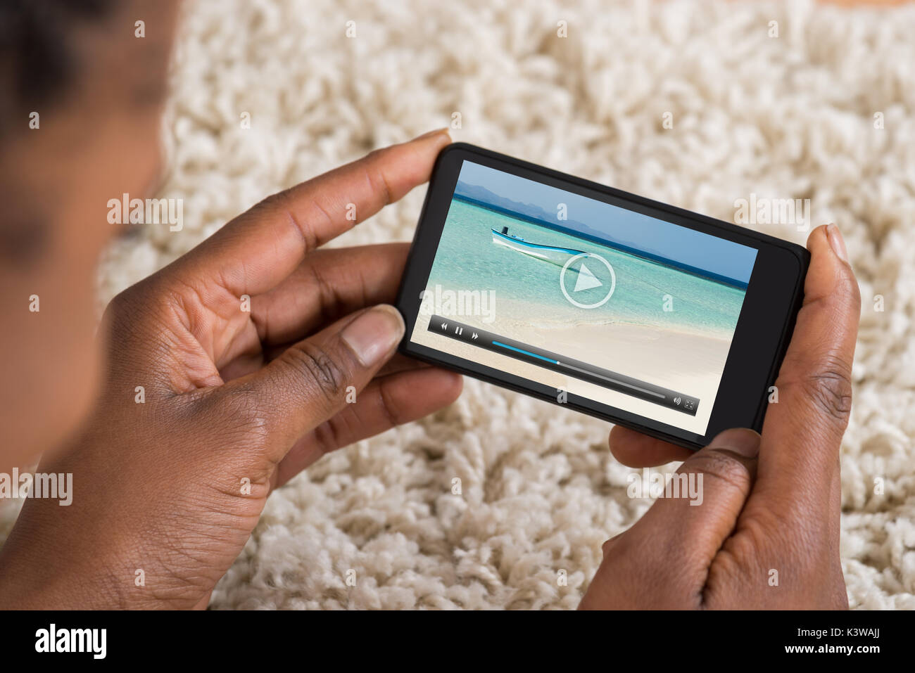 Mobile phone watching video hi-res stock photography and images - Alamy