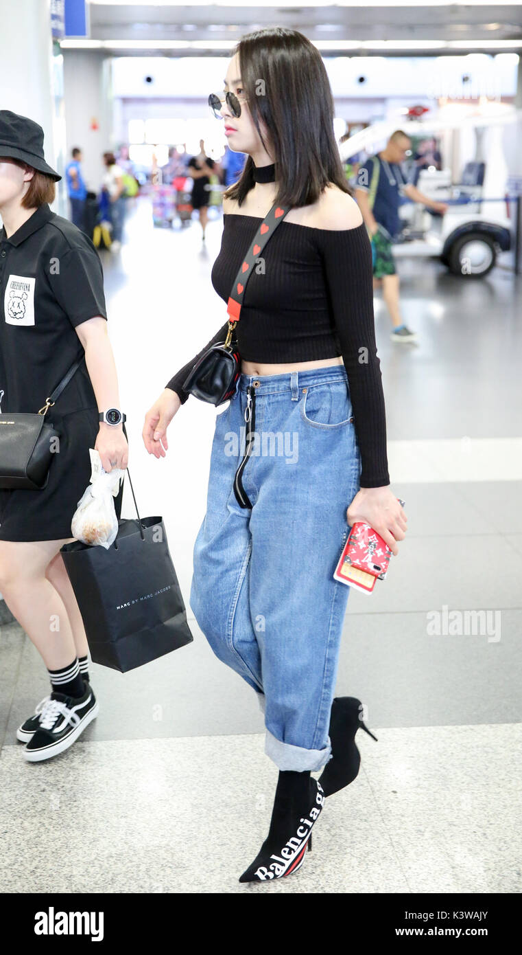 Chinese singer and actress Victoria Song arrives at Beijing Capital ...