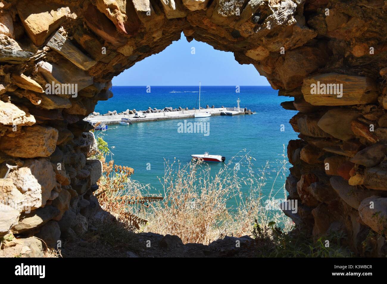 Traditional beautiful Greek village of Panormos on the island of Crete ...