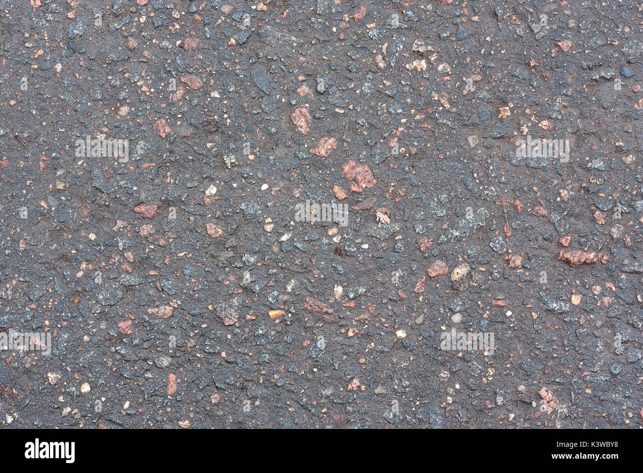 gray dry asphalt with stones Stock Photo - Alamy