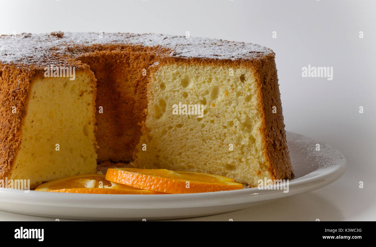 Home made Orange Chiffon Cake on white background Stock Photo - Alamy