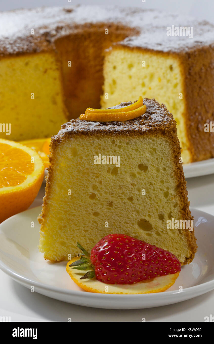 Home made Orange Chiffon Cake on white background Stock Photo - Alamy