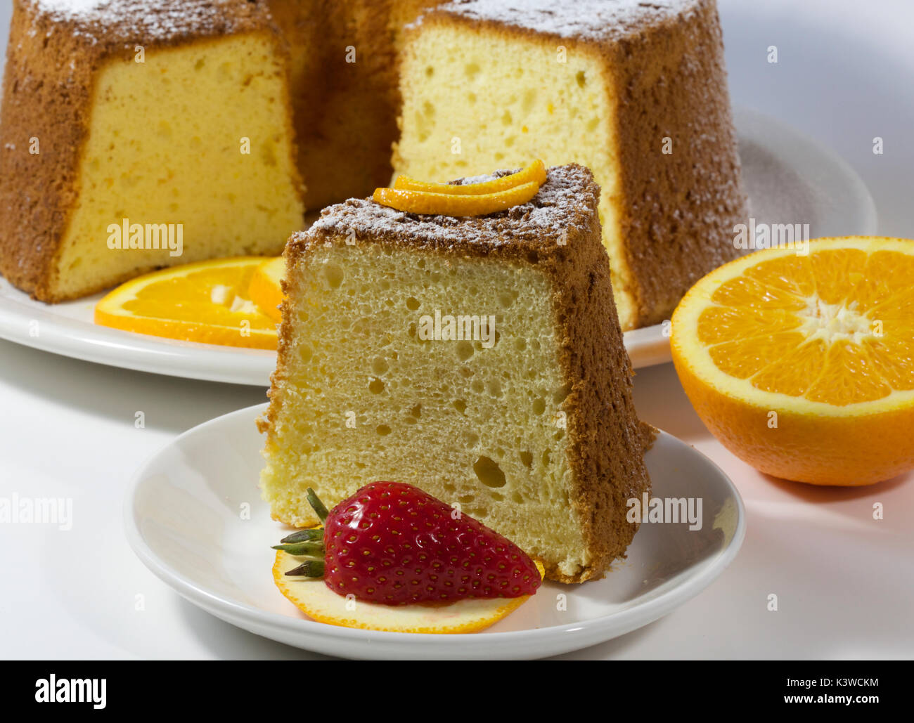 Home made Orange Chiffon Cake on white background Stock Photo - Alamy