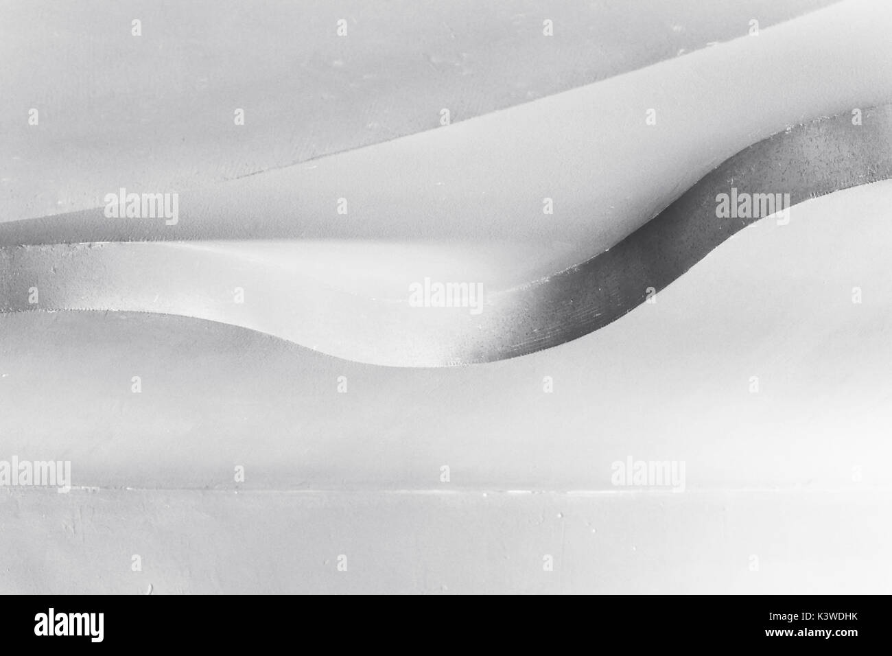 Black and white photo abstract bend of plasterboard on the ceiling ...