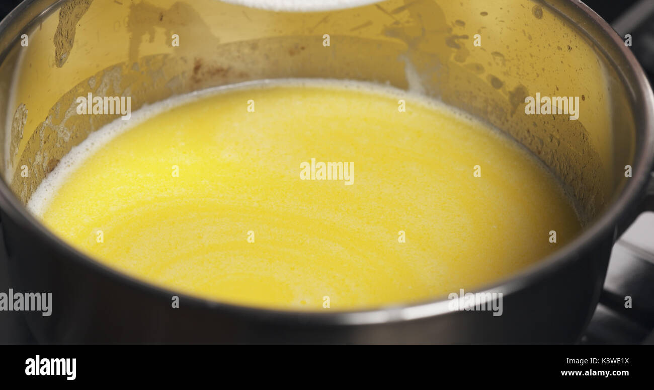 mix of melted butter with water Stock Photo - Alamy