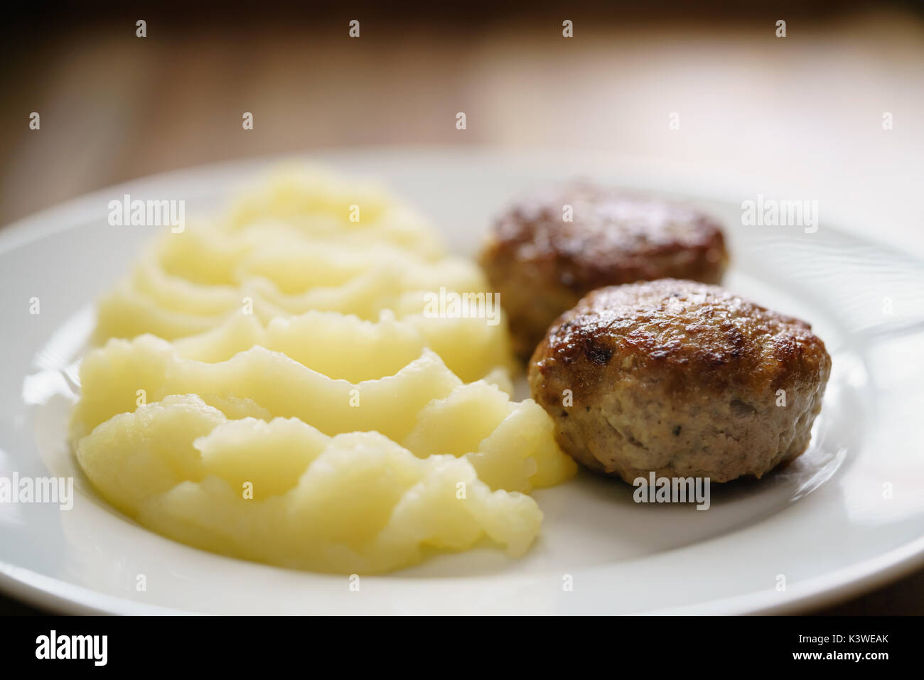 homemade cutlet with mashed potatoes on wood table Stock Photo - Alamy