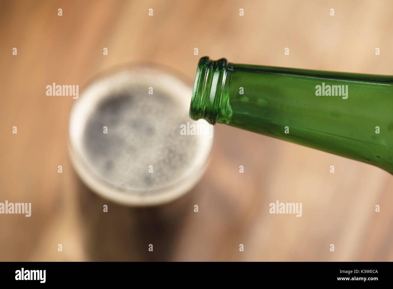 Pouring beer dark background hi-res stock photography and images - Alamy
