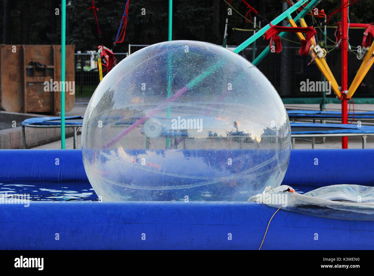 Inflatable small balloon for children on the water in pool. The ball in ...