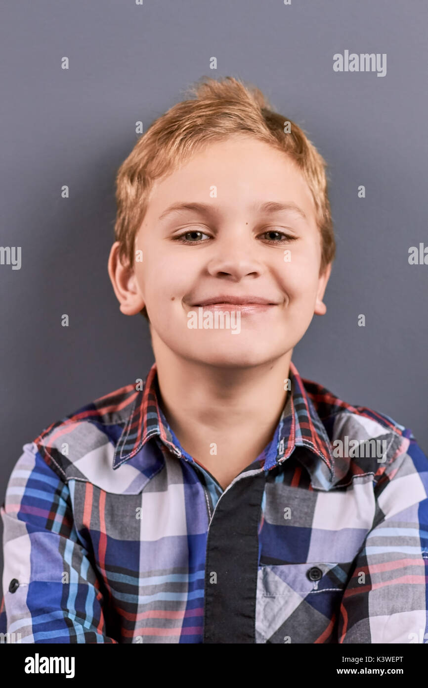 Beautiful handsome little boy, portrait. Studio shot of cute happy ...