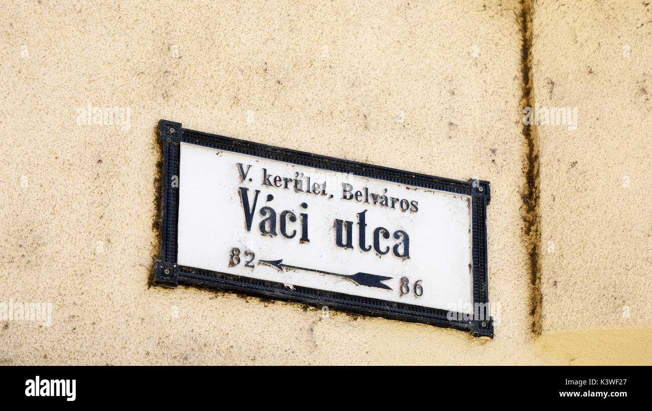 Street name sign on a wall, Vaci Utca, a famous shopping street in Pest ...