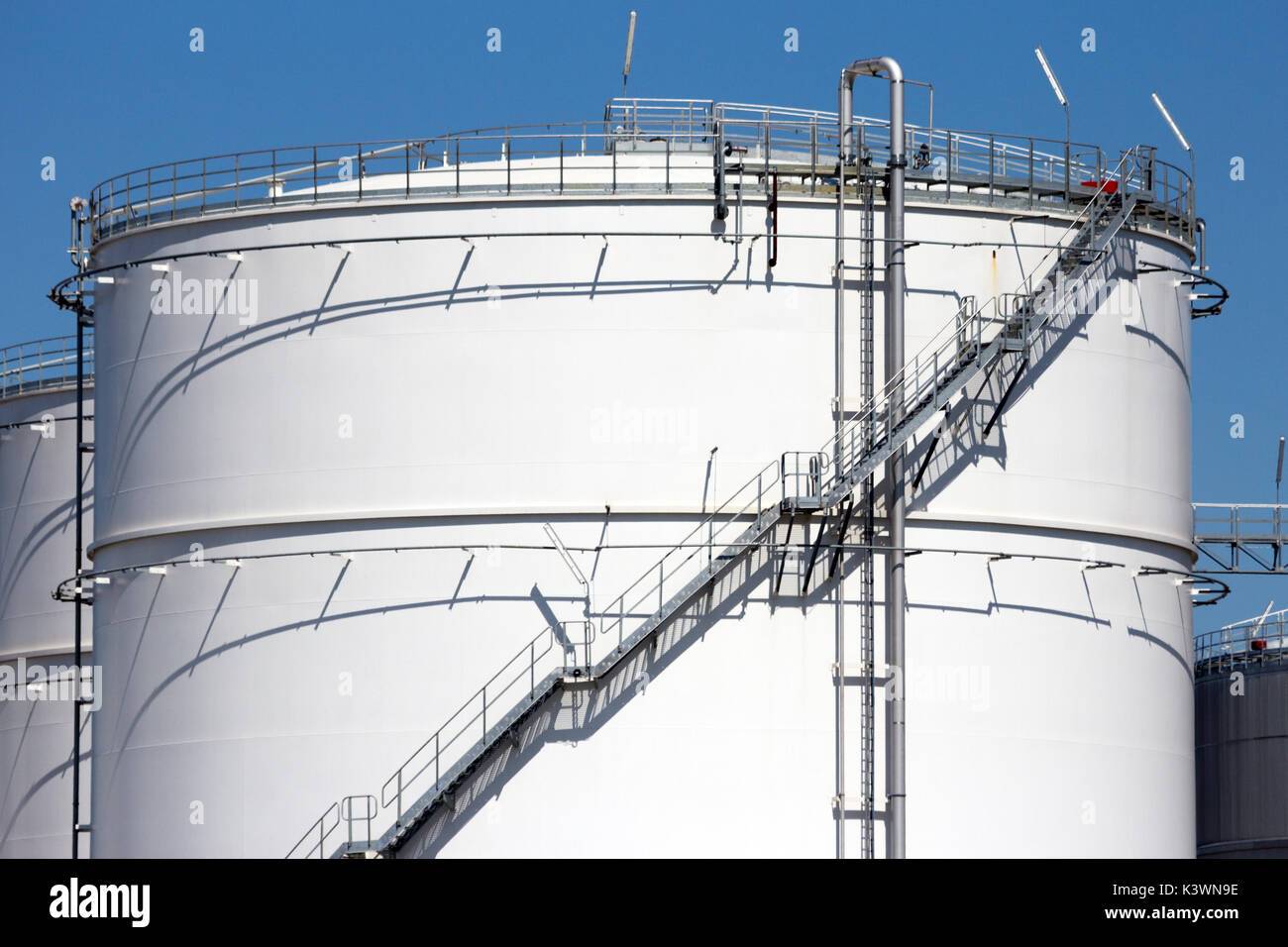 White oil storage tank Stock Photo - Alamy
