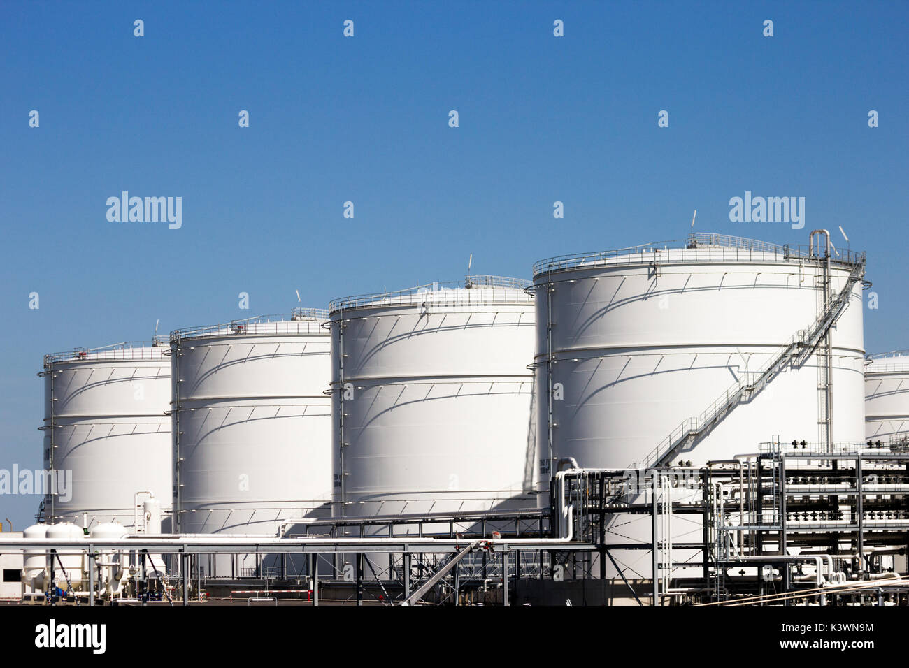 White oil storage tanks Stock Photo - Alamy