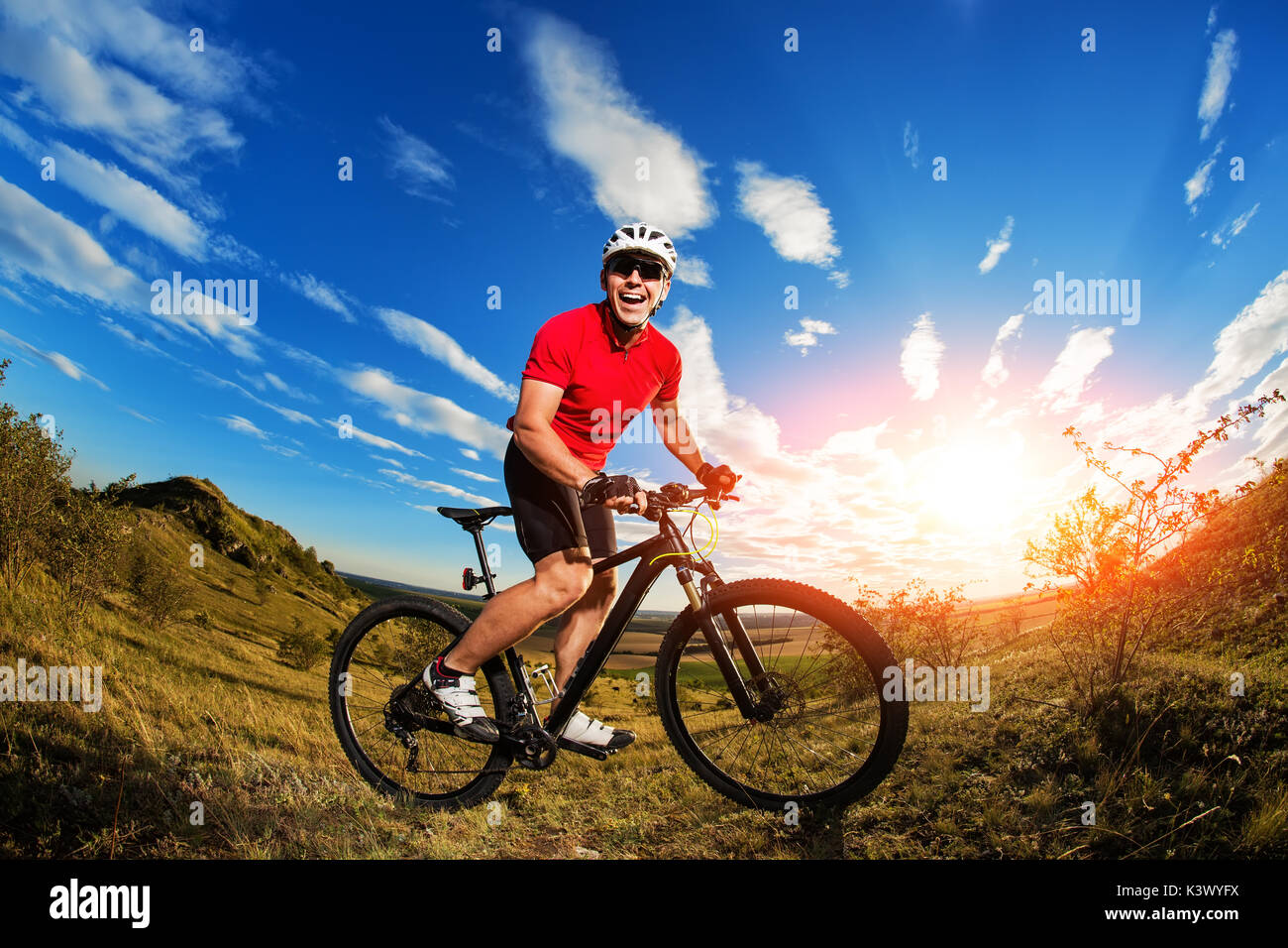 Male standing cyclist back view hi-res stock photography and images - Alamy