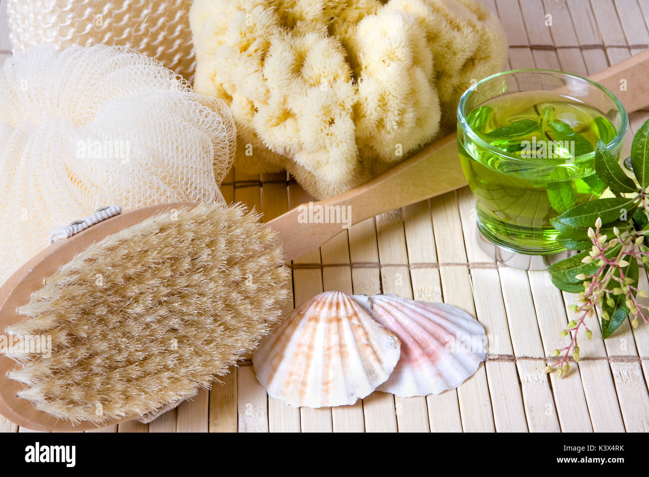 Green herbal tea and spa bath products, natural sponge Stock Photo - Alamy