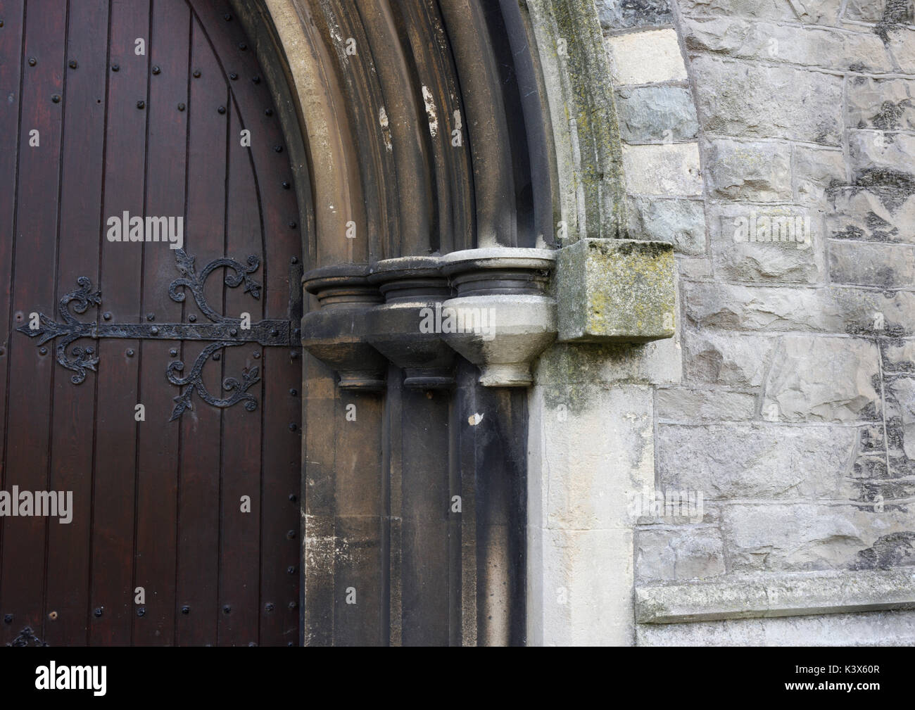 Church doorway with ornate metal strap hinges in llandudno north wales ...
