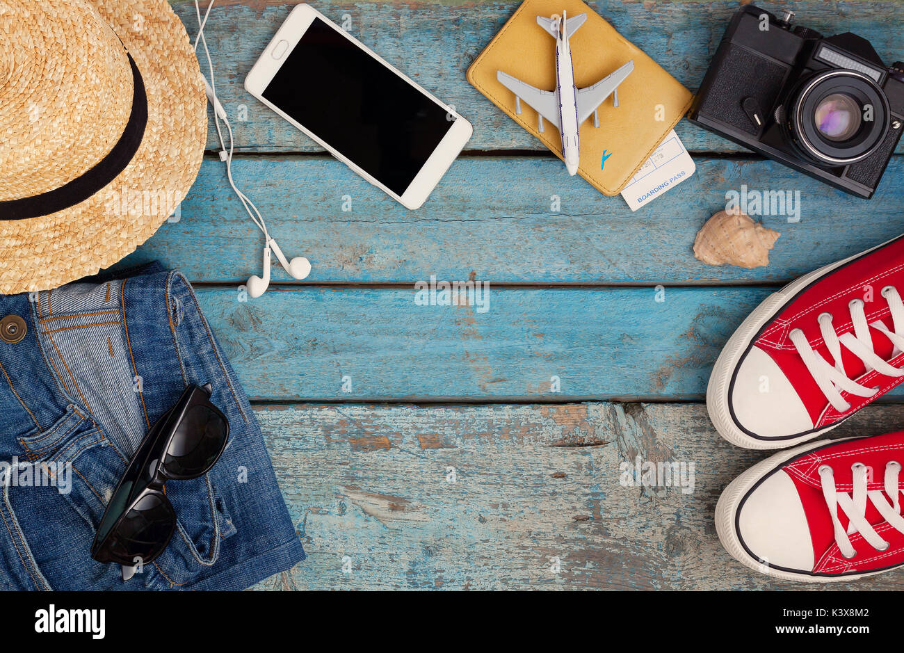 Still life of various items for recreation, clothing, hat, sneakers ...