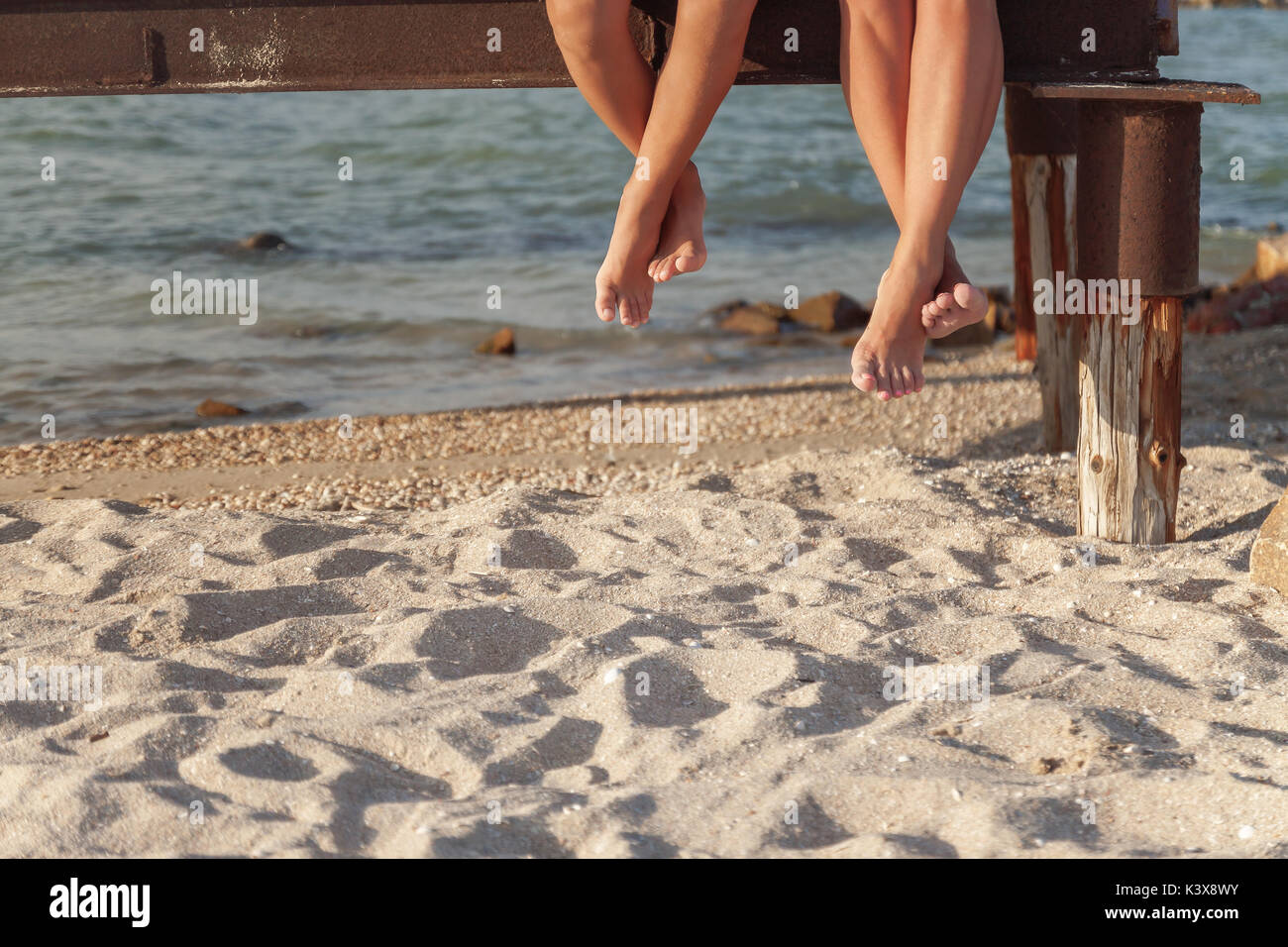 Child legs dangling hi-res stock photography and images - Alamy