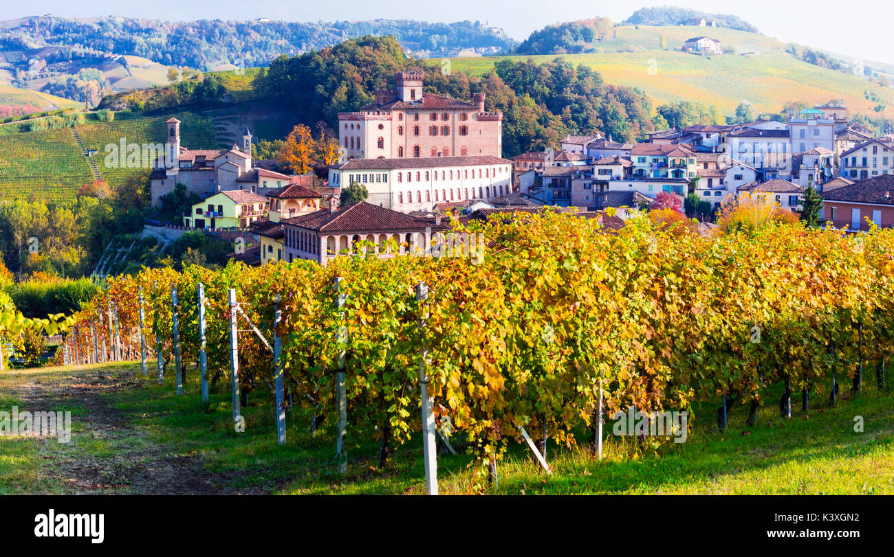 Autumn landscape - amazing golden vineyards and castles of Piedmont ...
