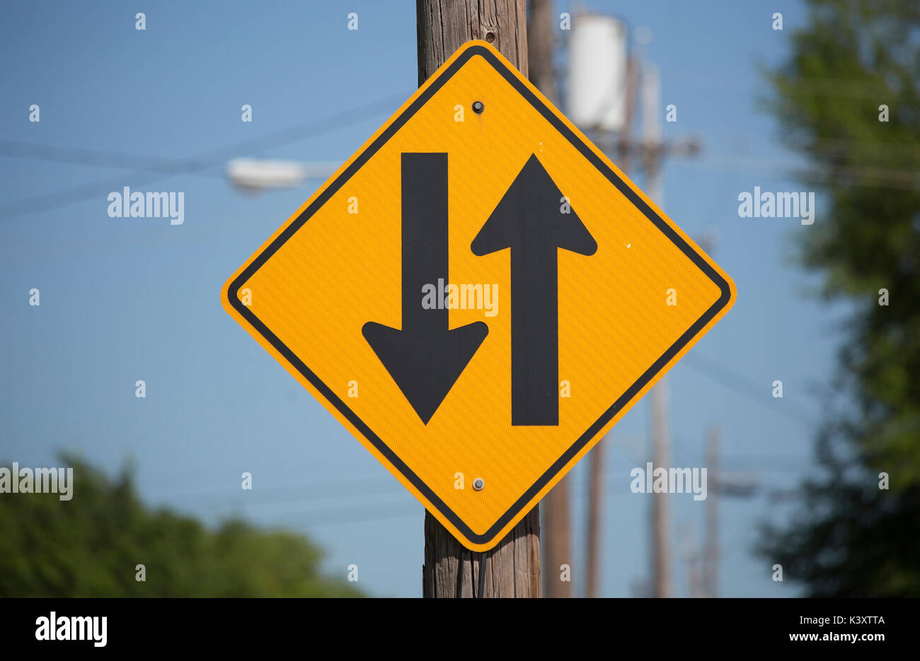 Close up of a two-way traffic sign on a utility pole Stock Photo - Alamy