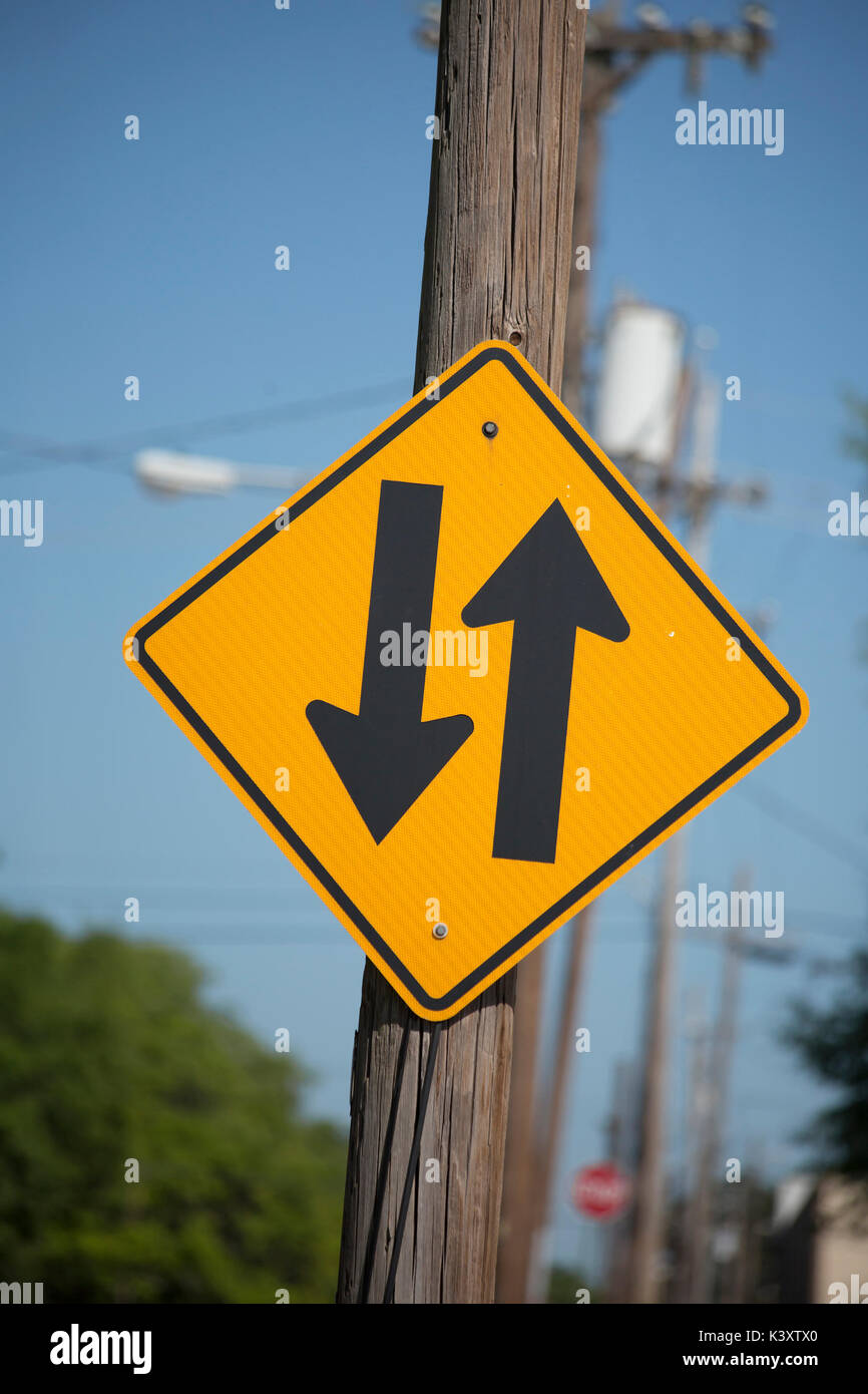 Close up of a two-way traffic sign on a utility pole Stock Photo - Alamy