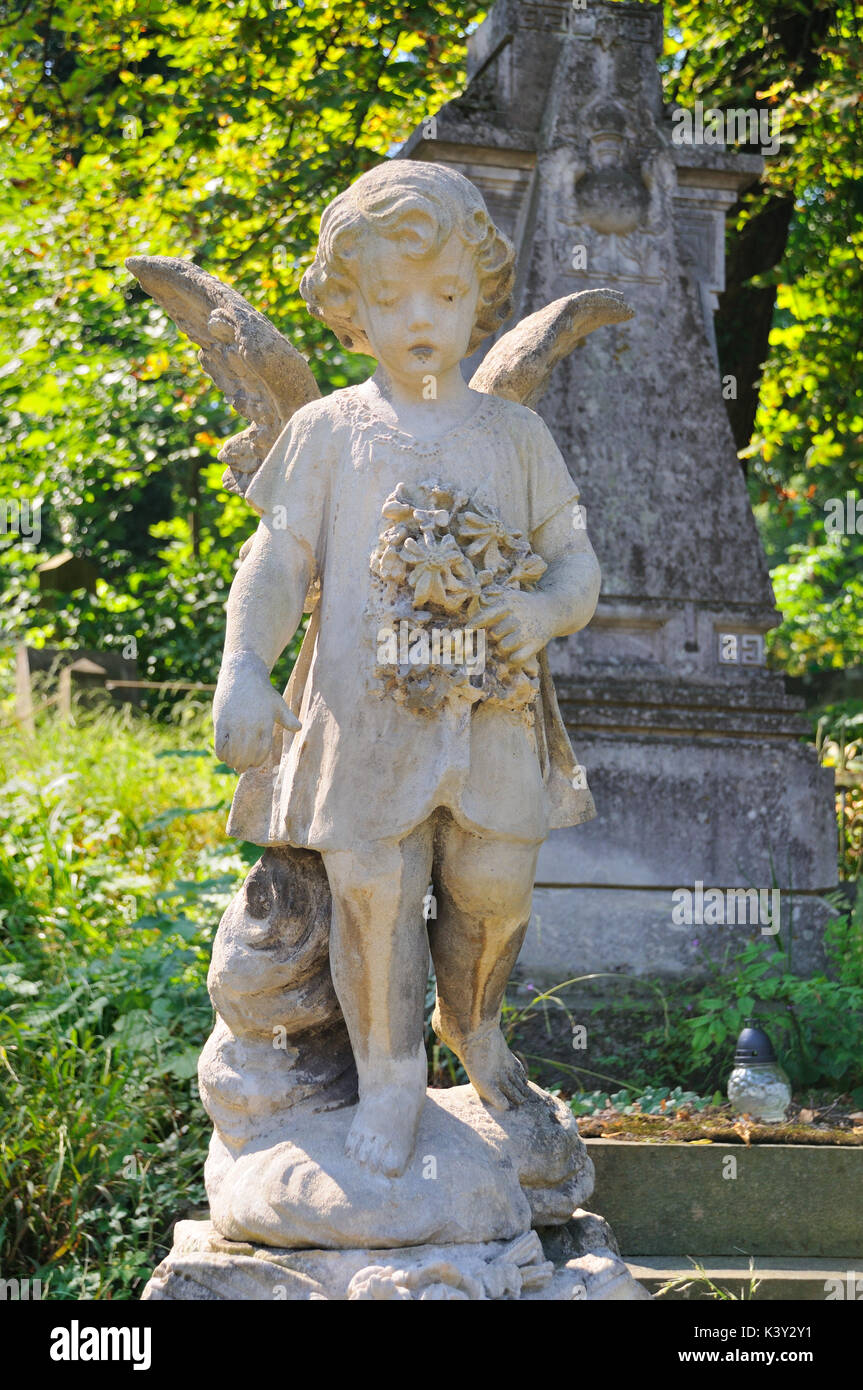 Old statue in Lychakiv Cemetery in Lviv, Ukraine Stock Photo - Alamy