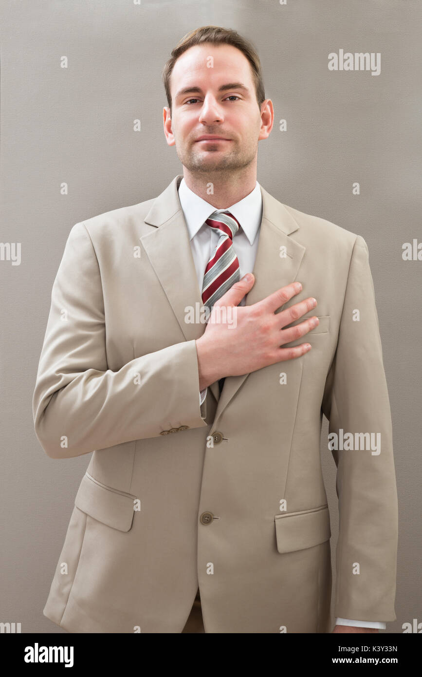 Hands On Chest Stock Photos & Hands On Chest Stock Images - Alamy