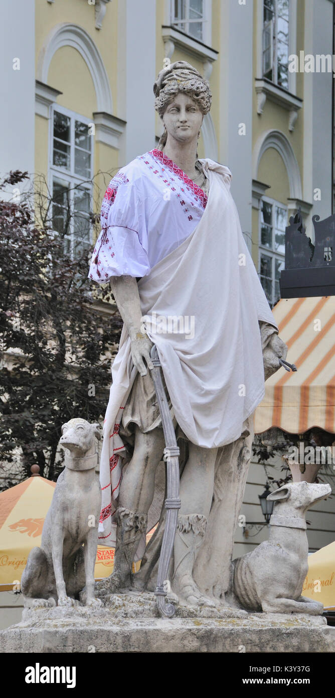 An ancient statue in the central square of Lviv - Market (Rynok) Square ...