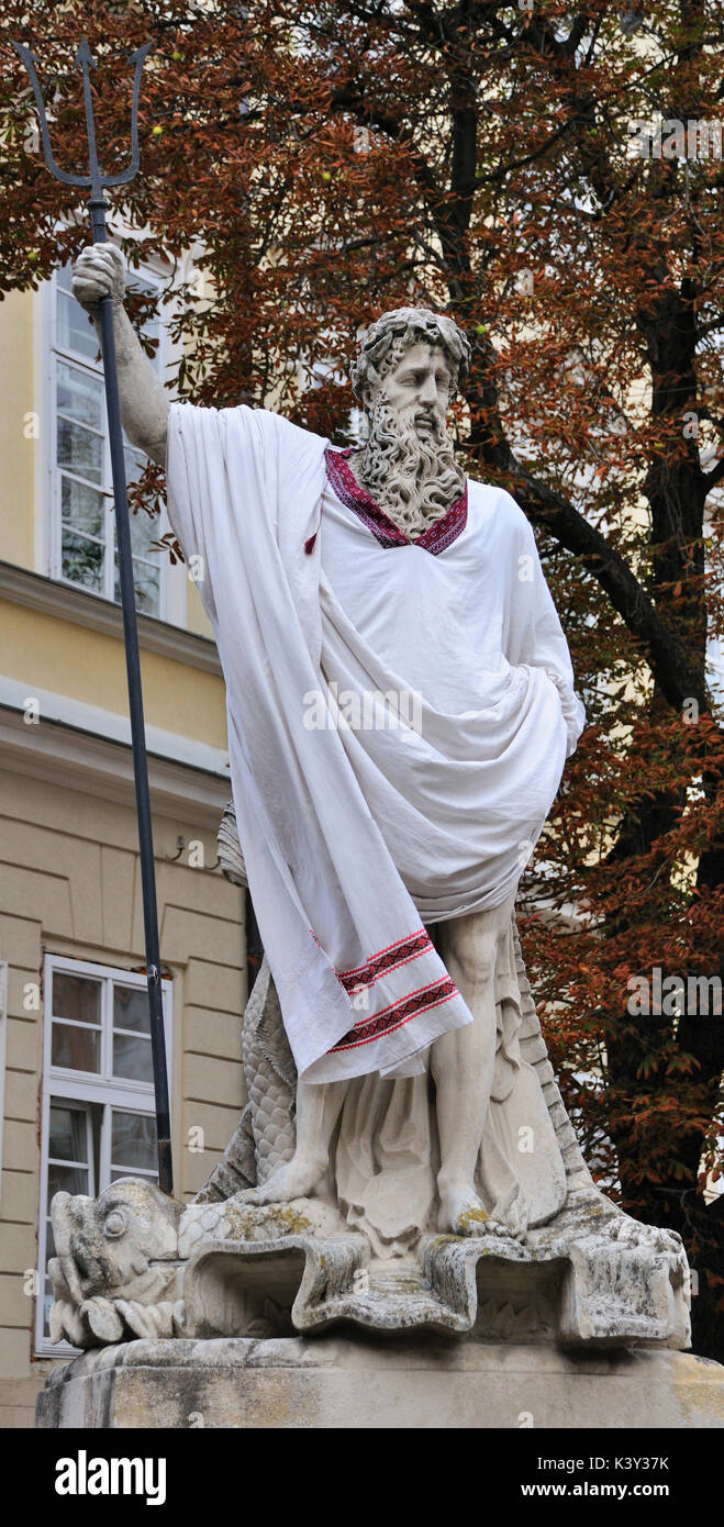 An ancient statue in the central square of Lviv - Market (Rynok) Square ...