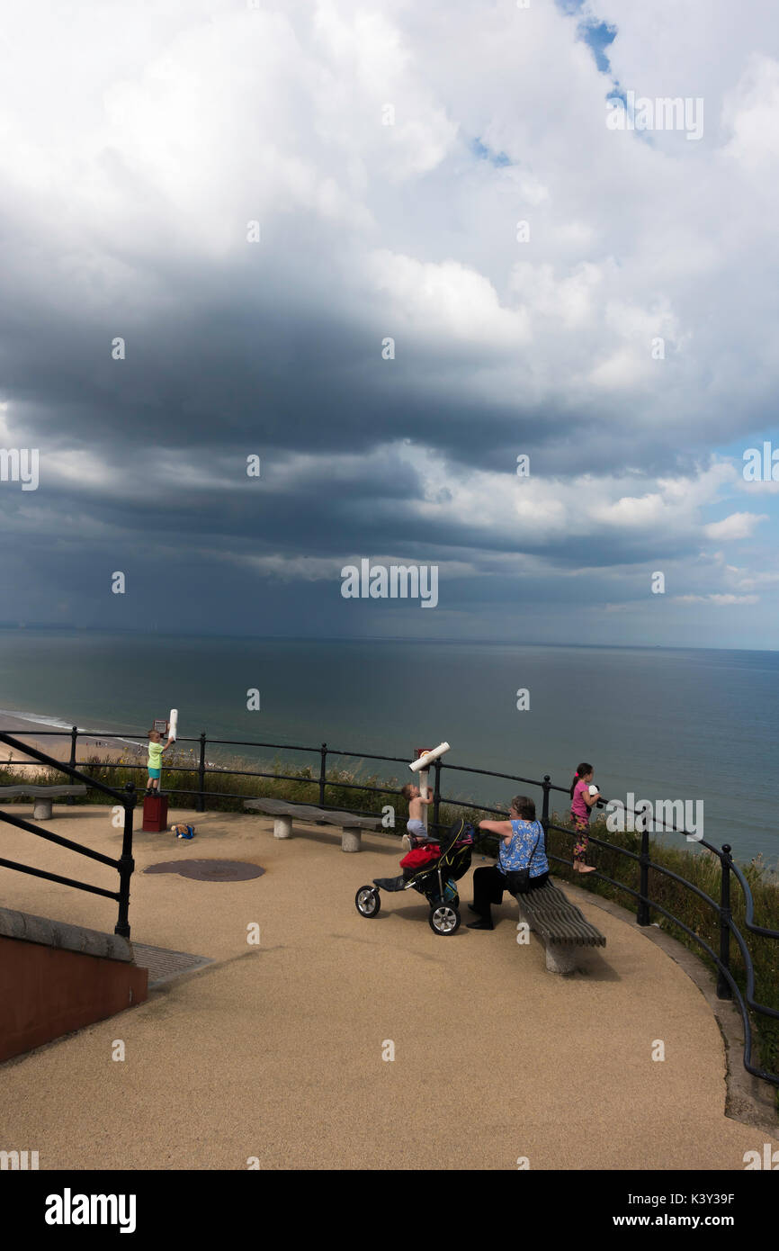Mother and children on the cliff top at Saltburn North Yorkshire with a ...